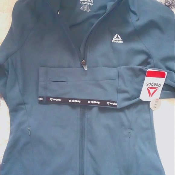 Reebok | Jackets & Coats | Reebok Womens Elevated Performance Jacket With Zipper Pocket Xs ...